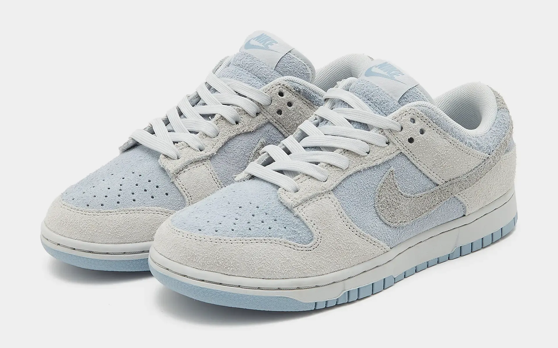 First Look At The Nike Dunk Low "Shaggy Blue" - TheSiteSupply